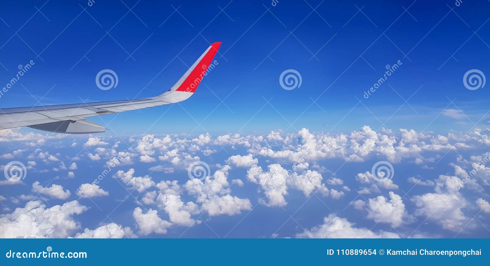 Right Wing of Jet Plane Over Cloudy Sky Stock Photo - Image of cumulus ...