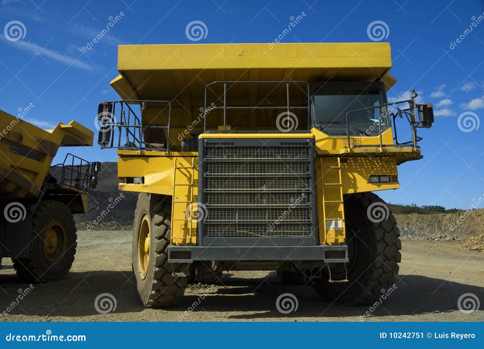 Rigid Dumper stock image. Image of terrain, wheel, chains - 10242751