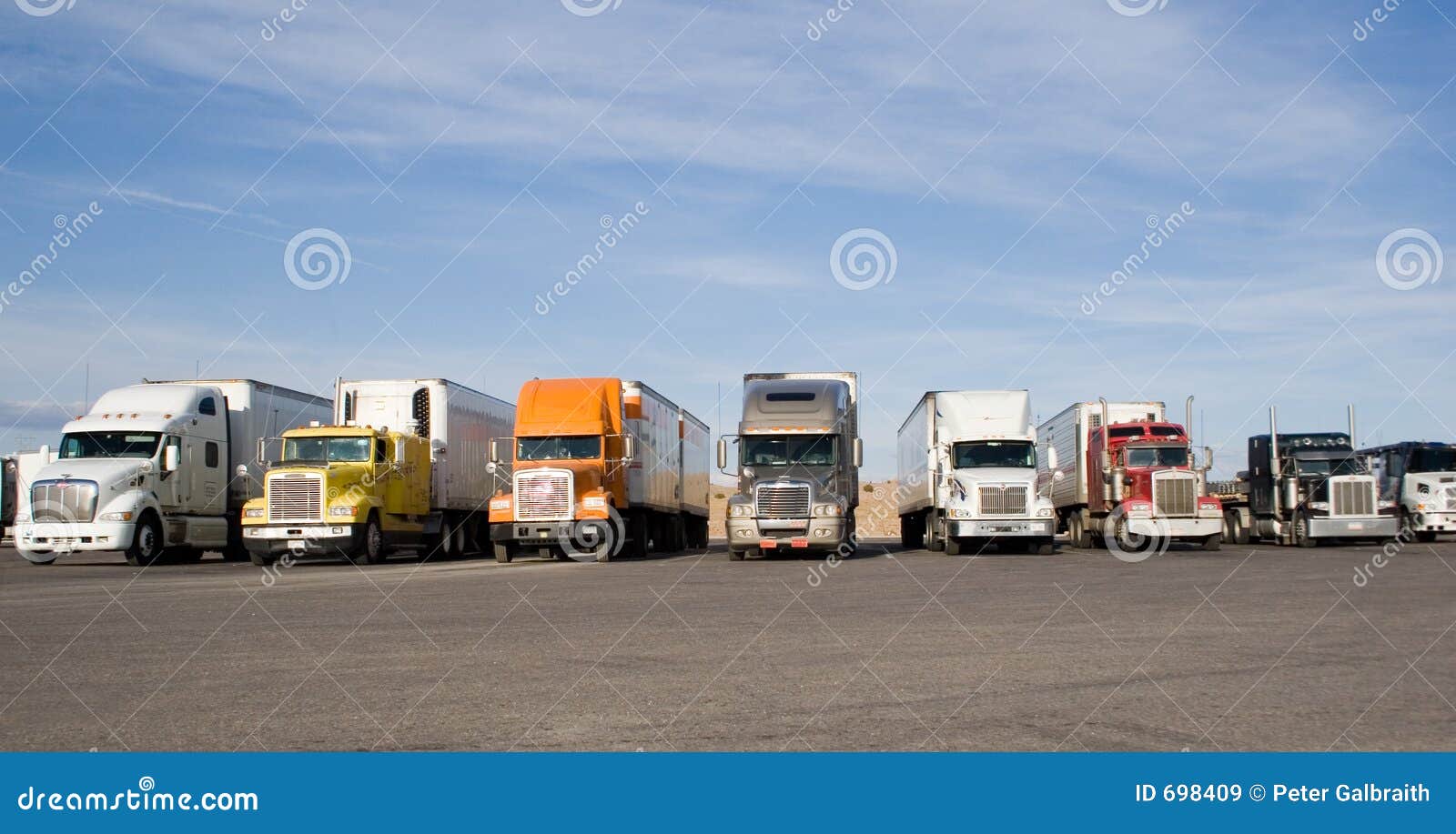 Rigs in a row stock image. Image of hauling, orange, delivery - 698409