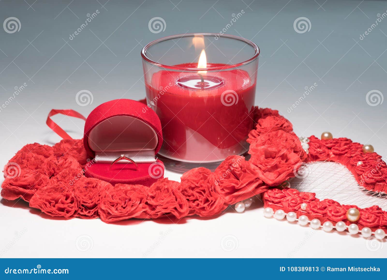 The Ring in a Case in the Form of a Heart Stands on a White Table ...