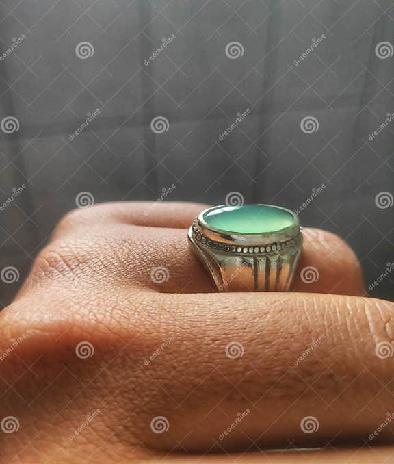 Ring Finger with Green Stone Ring Stock Image - Image of silver, batu ...
