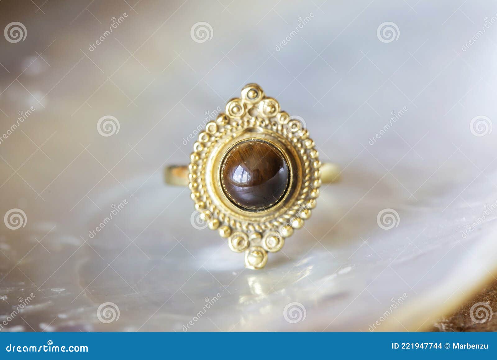 Ring in Indian Oriental Style on Natural Neutral Shell Background Stock ...