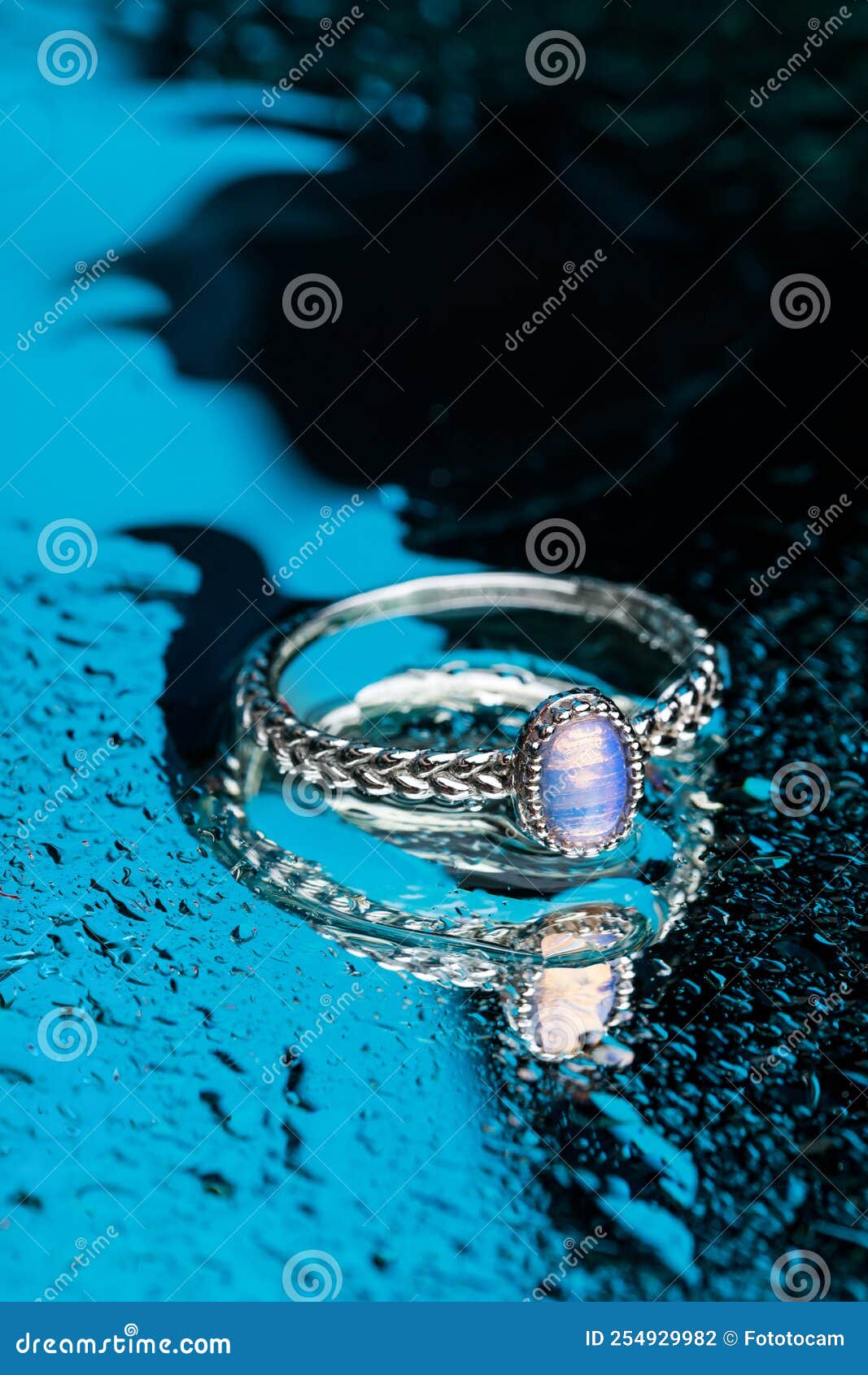Ring with Moonstone on Black Background with Water Drops- Image Stock Photo - Image of carat ...