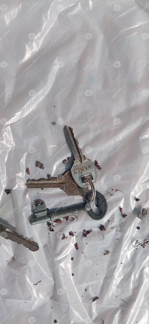 Ring and Old Keys on Texture of White Plastic Stock Photo - Image of ...