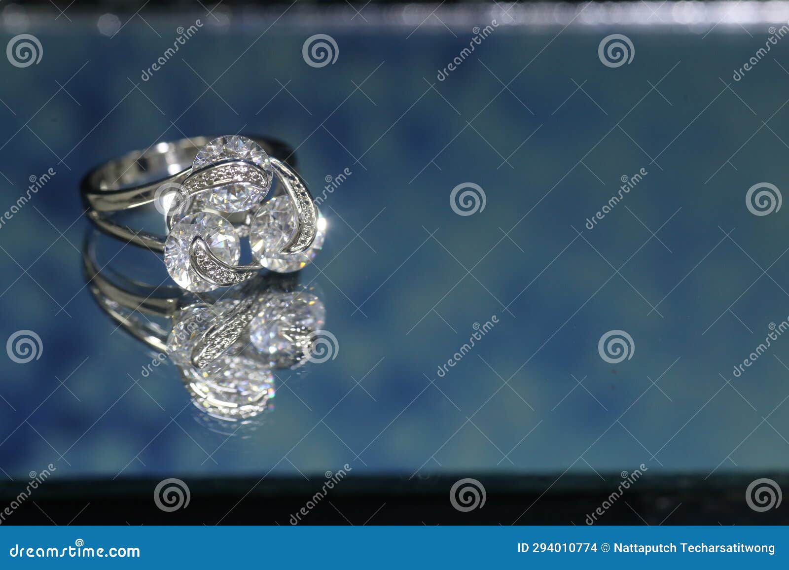Ring with Three Diamonds. Golden Wedding Rings Stock Photo - Image of ...