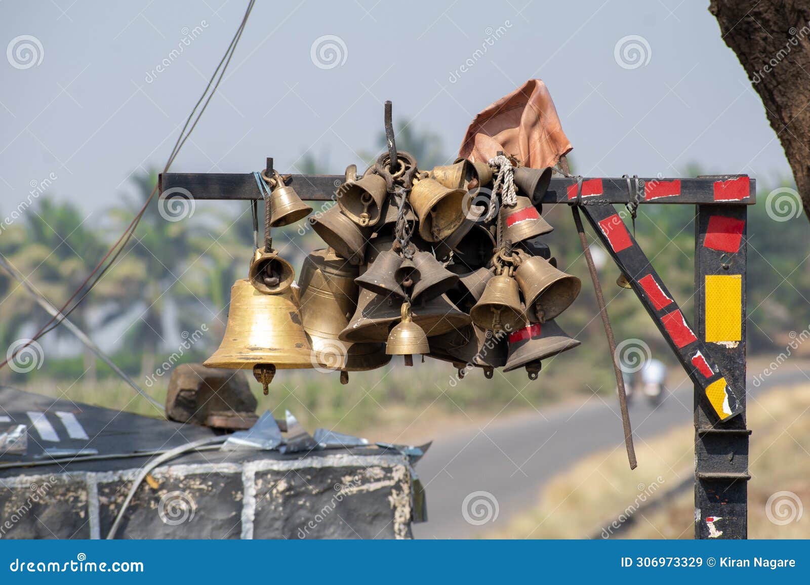 Ringing Bells of a Religious Temple. Brass Praying Bells Hanging on Old ...