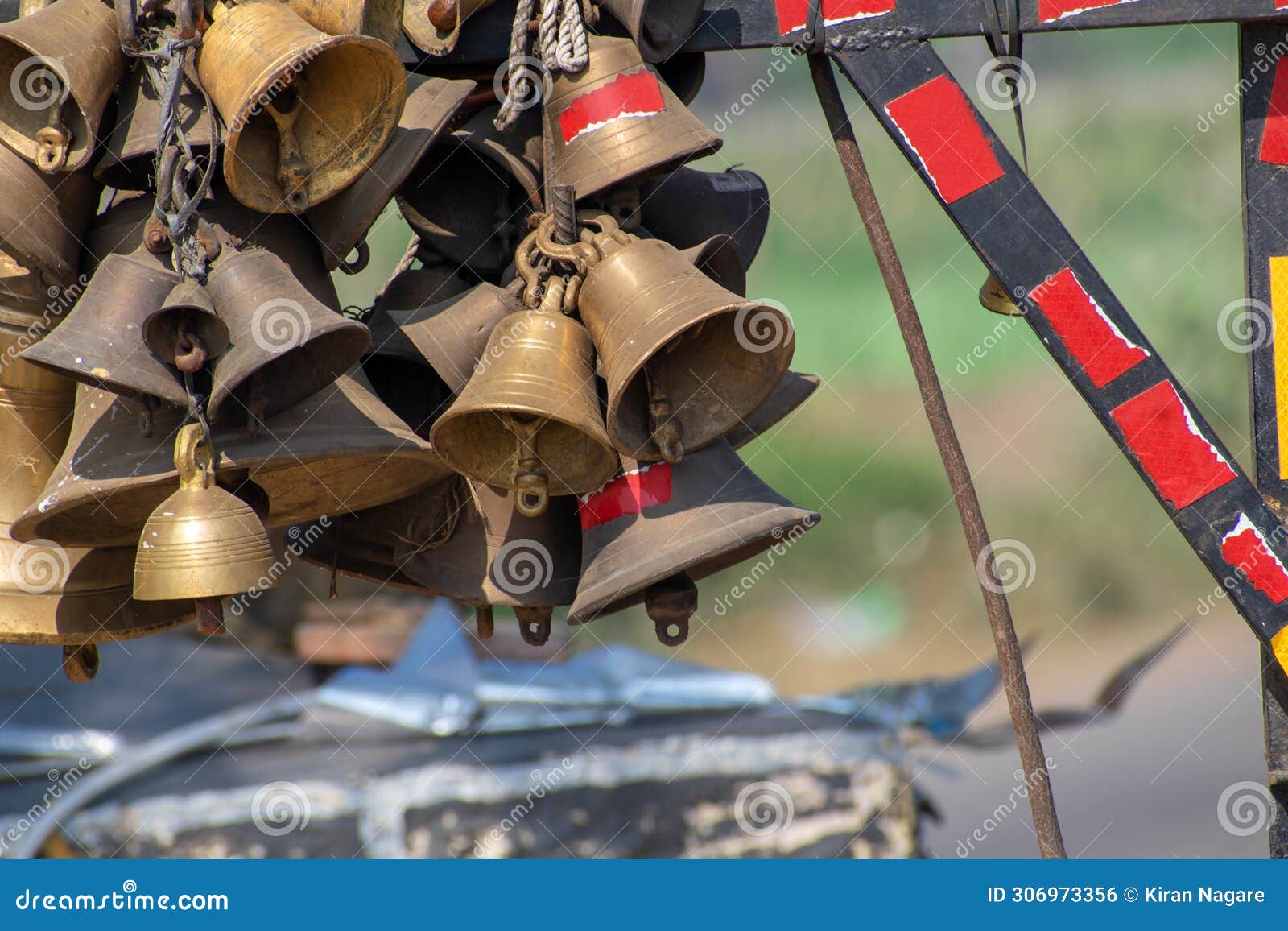 Ringing Bells of a Religious Temple. Brass Praying Bells Hanging on Old ...