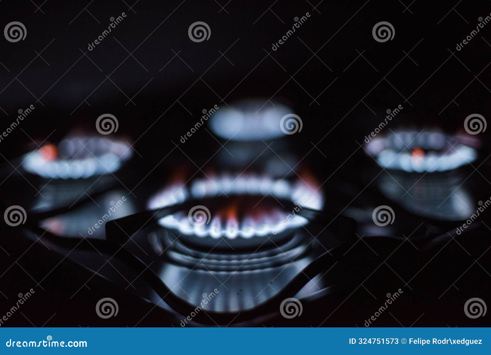 Rings of Fire: Four Lighted Gas Stove Burners Stock Image - Image of ...