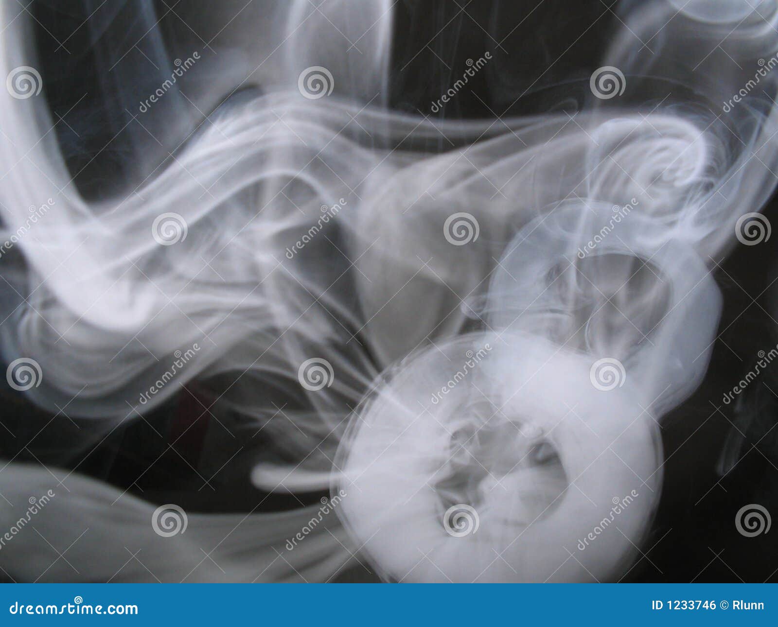 Rings of smoke stock photo. Image of cigar, fire, cigarette - 1233746