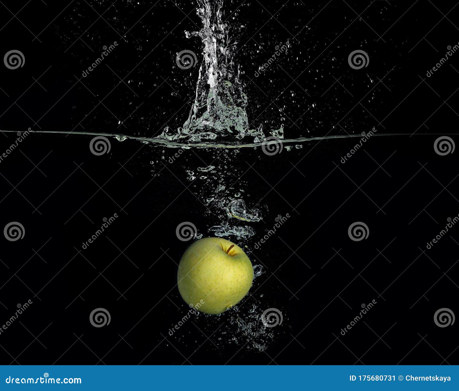 Ripe Apple Falling Down into Clear Water with Splashes Against ...