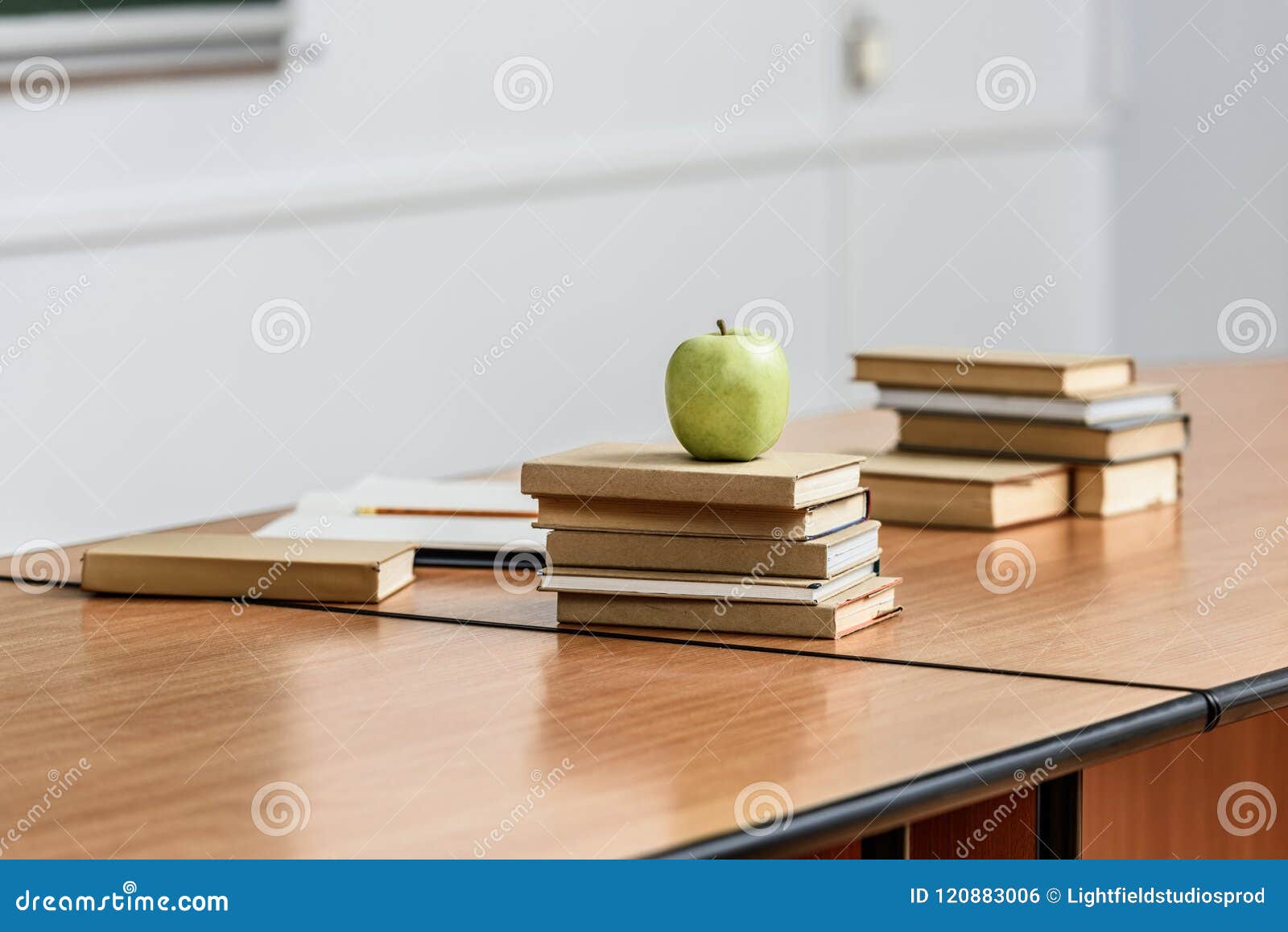 Ripe Apple on Stack of Books on Table Stock Photo - Image of appetizing ...