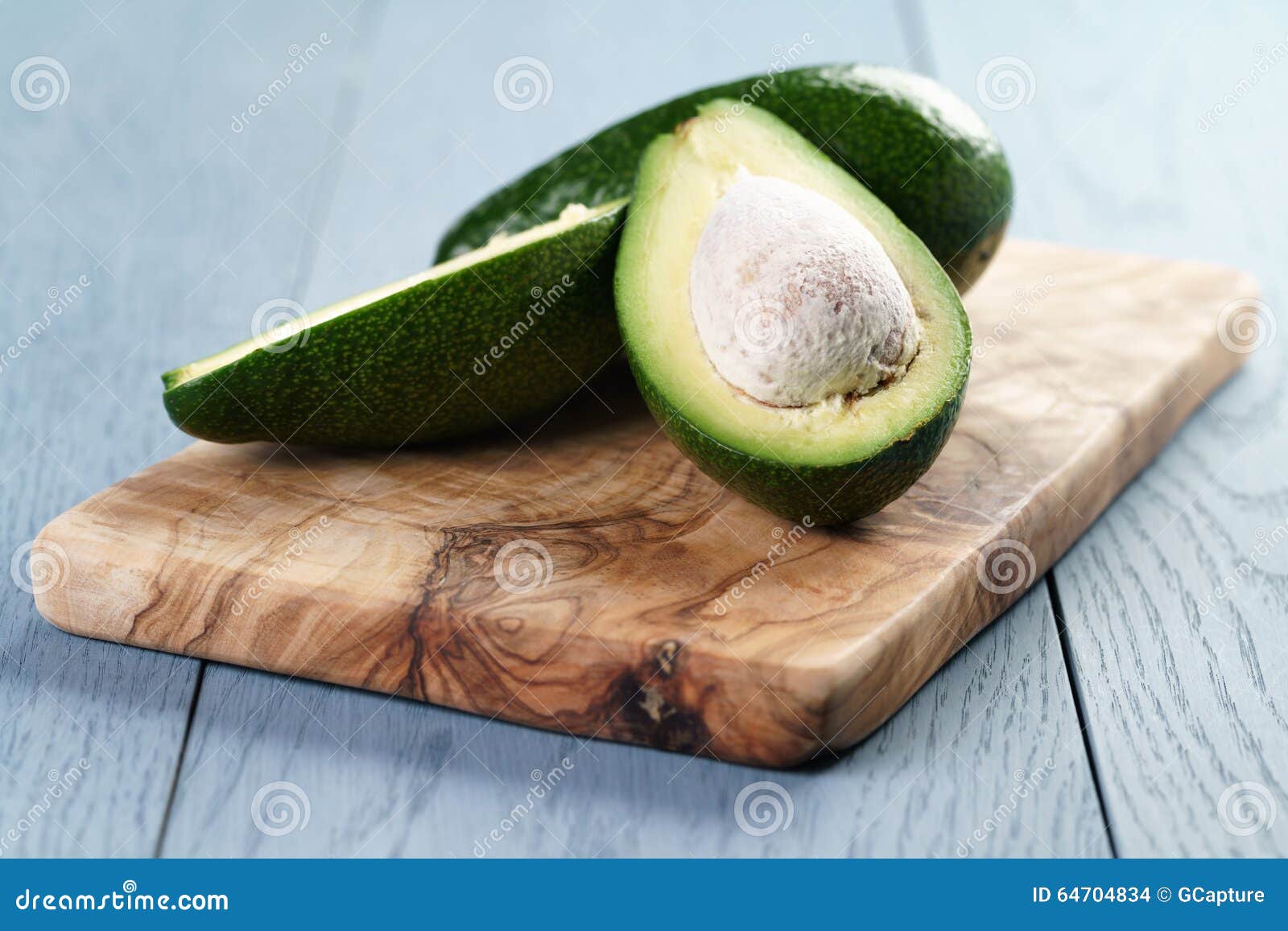 Ripe Avocado Half Cut on Cutting Board Stock Photo - Image of vegetable ...