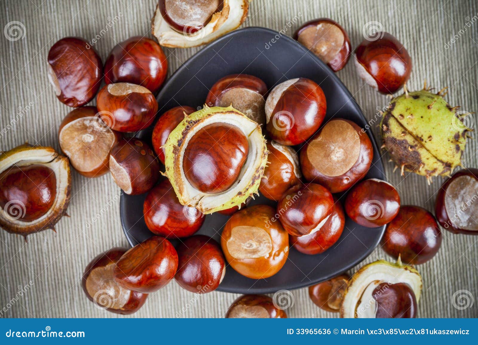 Ripe chestnuts, top view stock photo. Image of bowl, season - 33965636