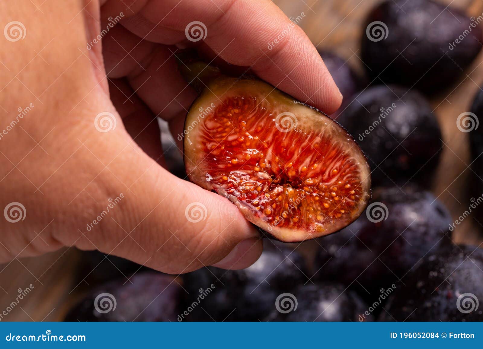 Ripe fig pulp close-up stock photo. Image of pulp, fingers - 196052084