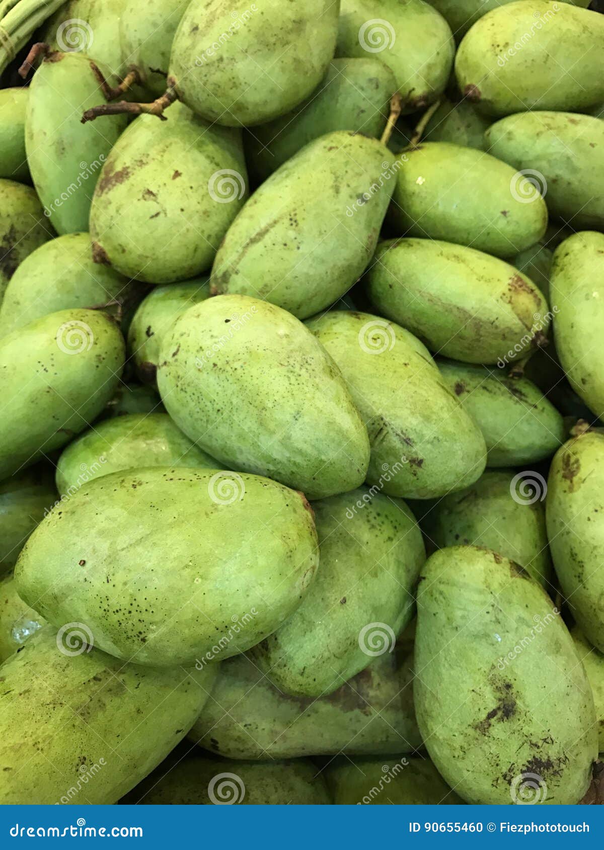 Ripe green mango fruits stock photo. Image of market - 90655460