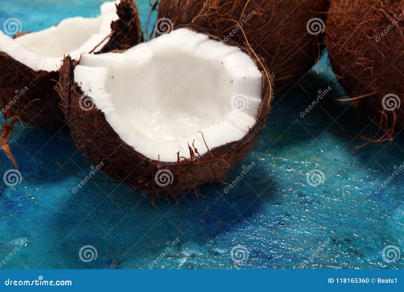 Ripe Half Cut Coconut on a Blue Background Stock Photo - Image of food ...