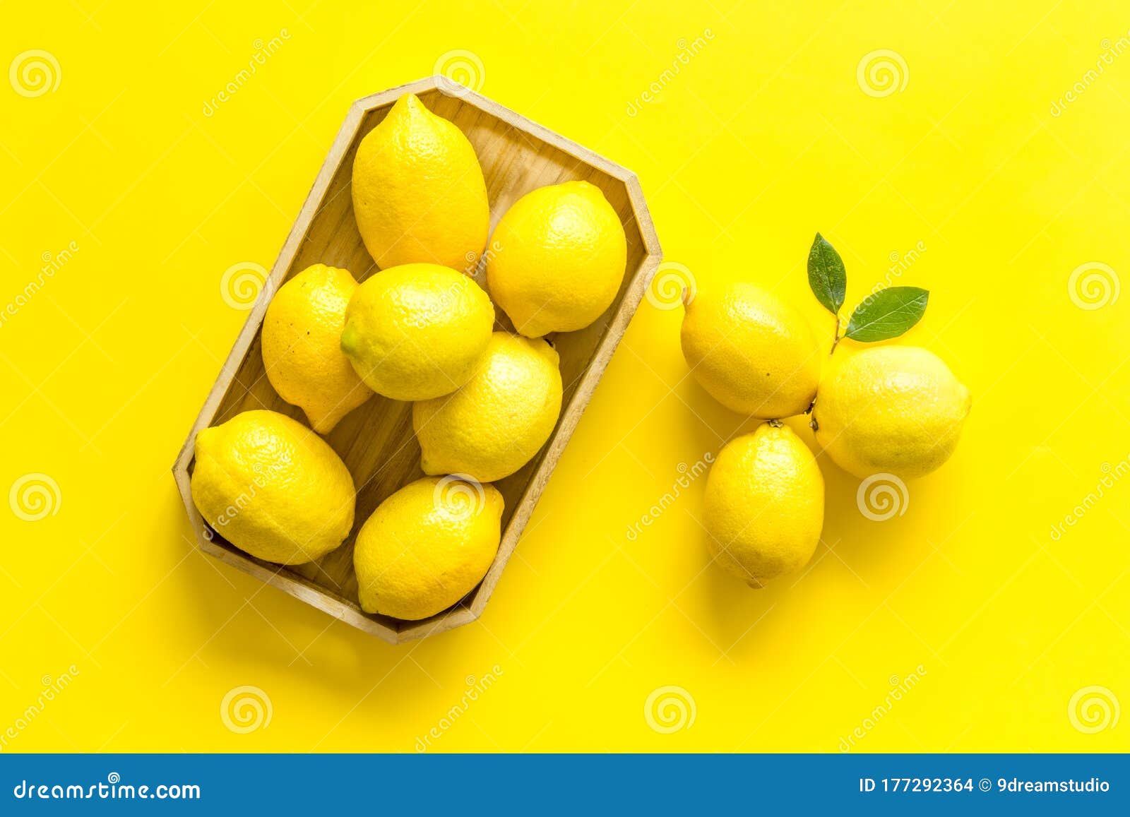 Ripe Lemons in Tray on Yellow Backgroud Top-down Stock Photo - Image of ...