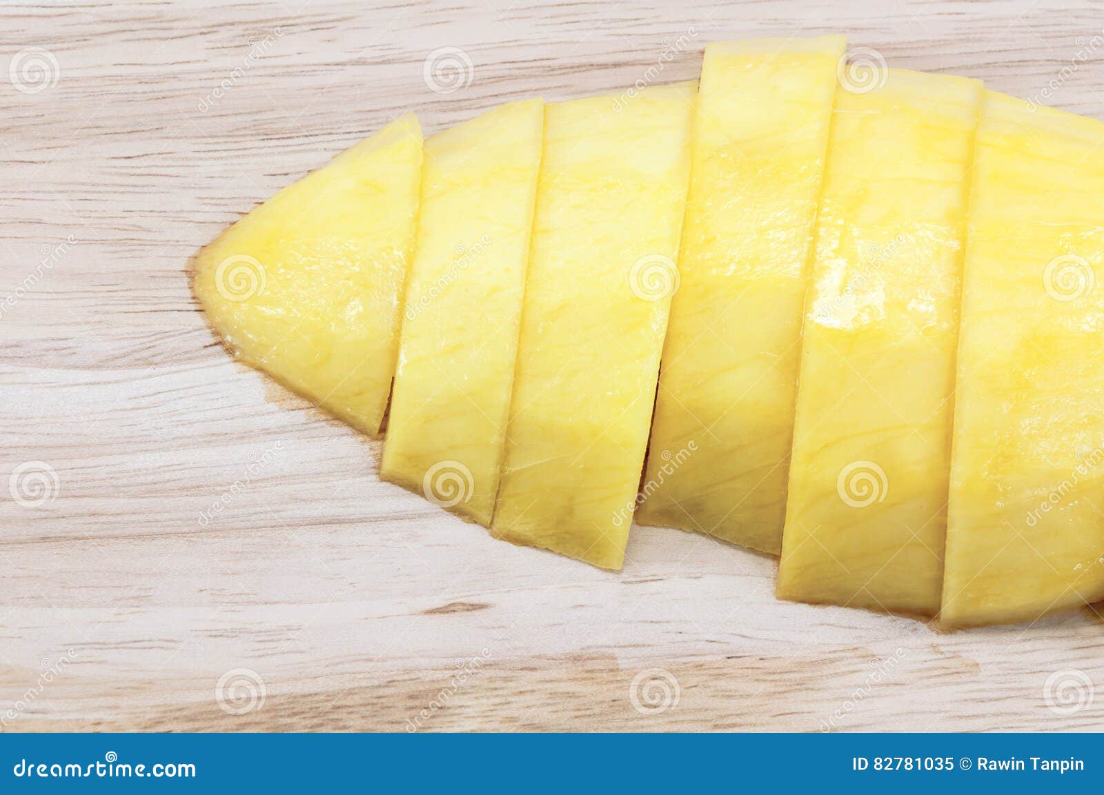 Ripe Mango Cut into Pieces on Wooden Stock Image - Image of floor ...
