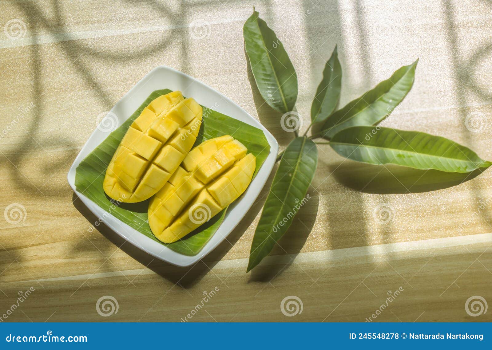 Ripe Mangoes are Placed on a Plate Stock Photo - Image of leaf, sliced ...