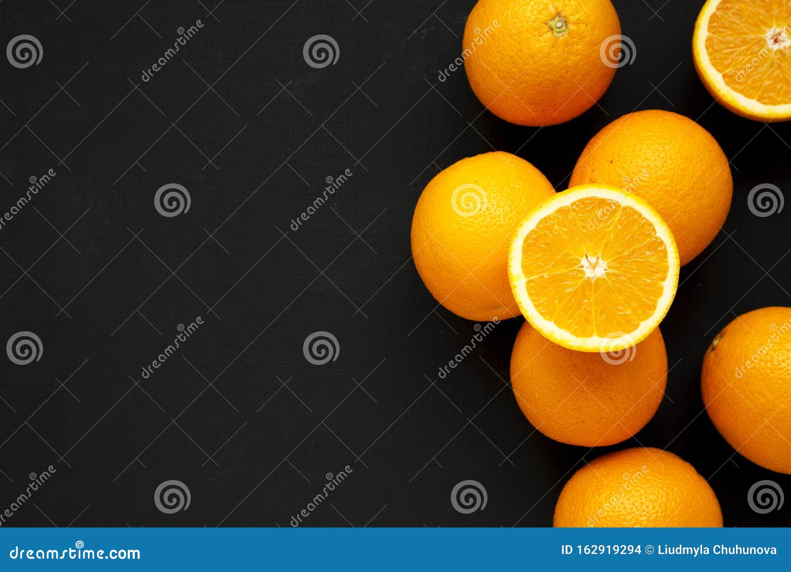Ripe Organic Oranges on a Black Background, Top View. Flat Lay ...