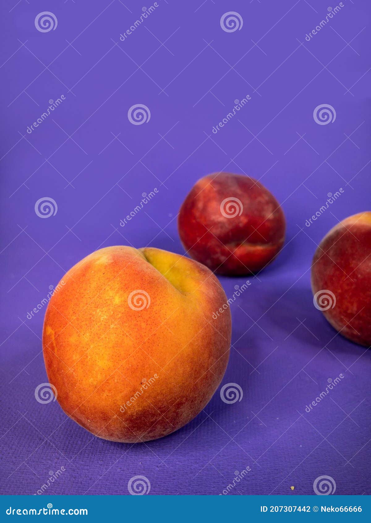 Ripe Peaches on a Solid Purple Background Stock Photo - Image of ...