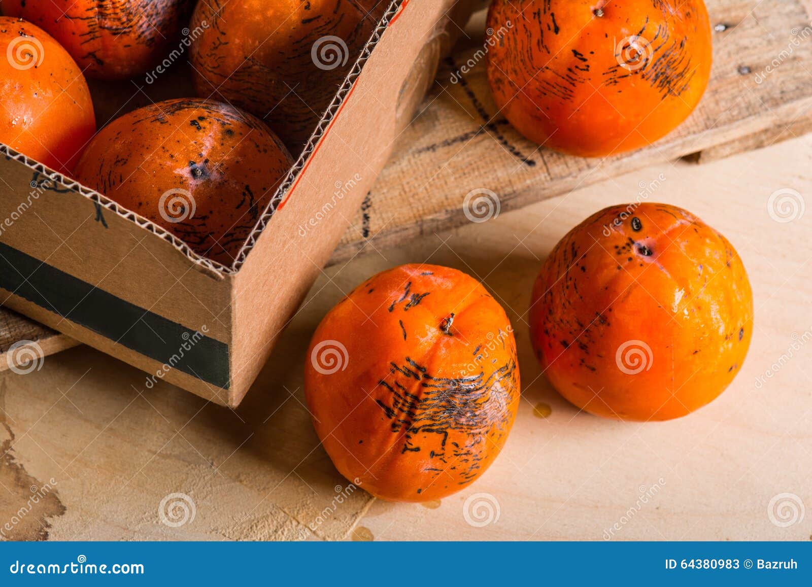 Persimmon in box stock image. Image of winter, garden - 64380983