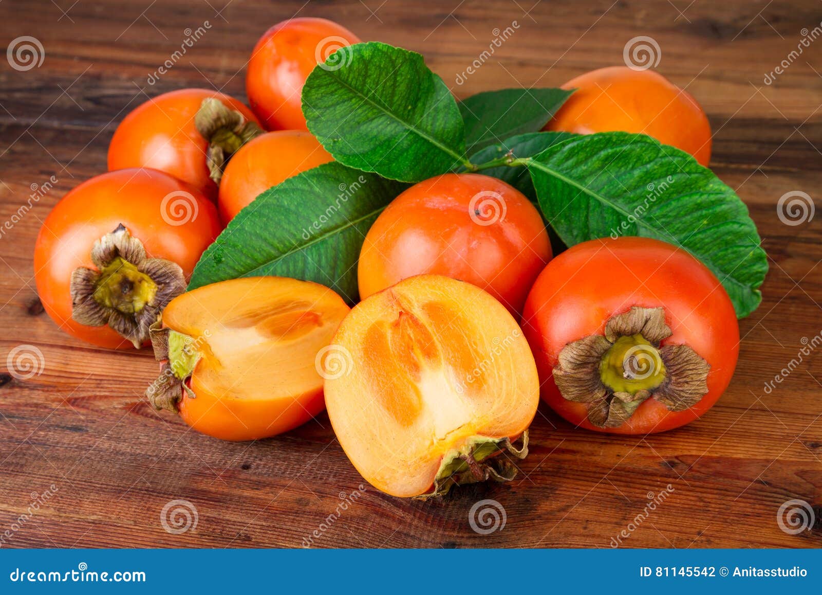 Ripe Persimmons Kaki Fruits On Rustic Background Stock Photo ...