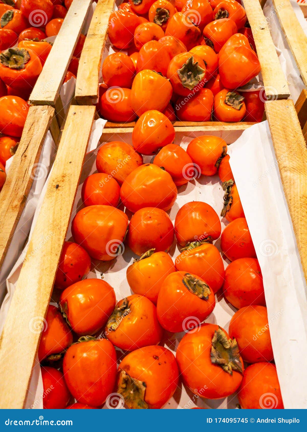 Ripe Persimmons on a Shelf in a Store Stock Image - Image of business ...
