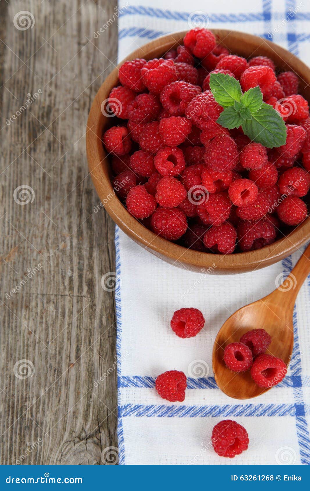 Ripe raspberries in a bowl stock photo. Image of berry - 63261268