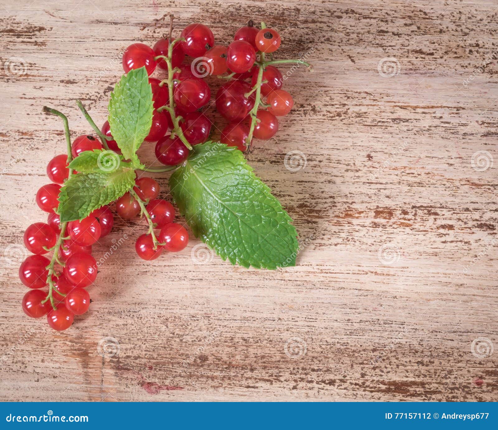 Ripe Red Currant with Leaves on a Wooden Background. Stock Photo ...