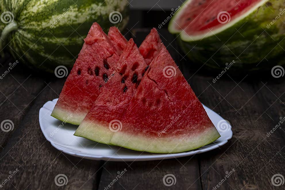 Ripe Red Slices of Watermelon on the Table Stock Image - Image of ...