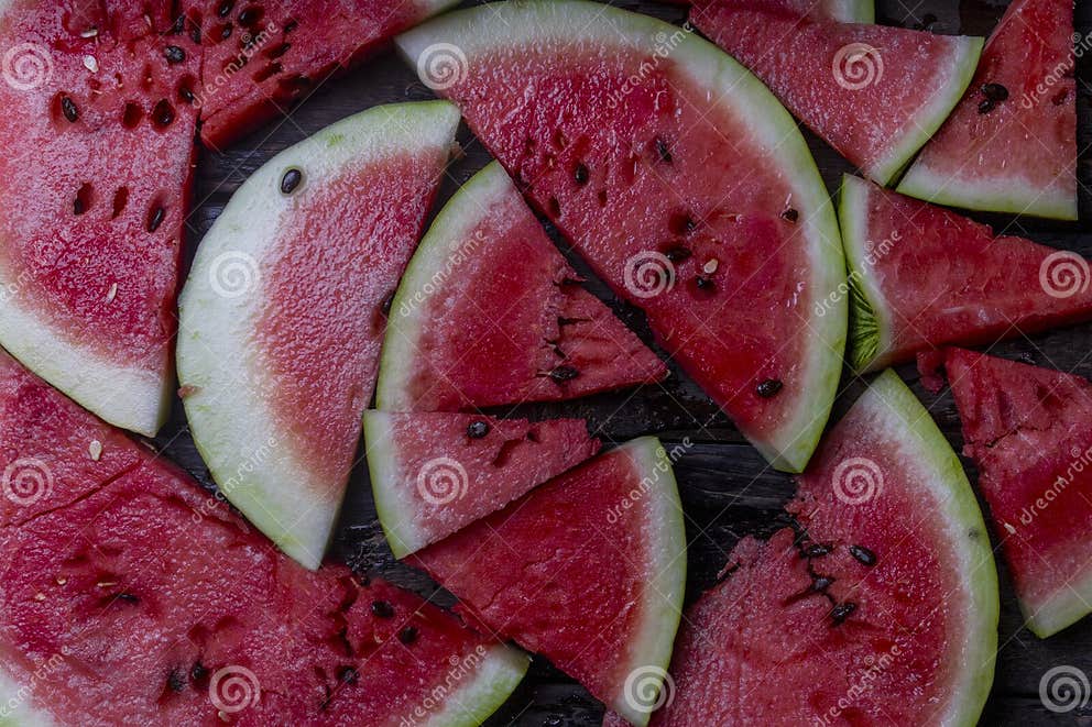 Ripe Red Slices of Watermelon on the Table Stock Photo - Image of ...