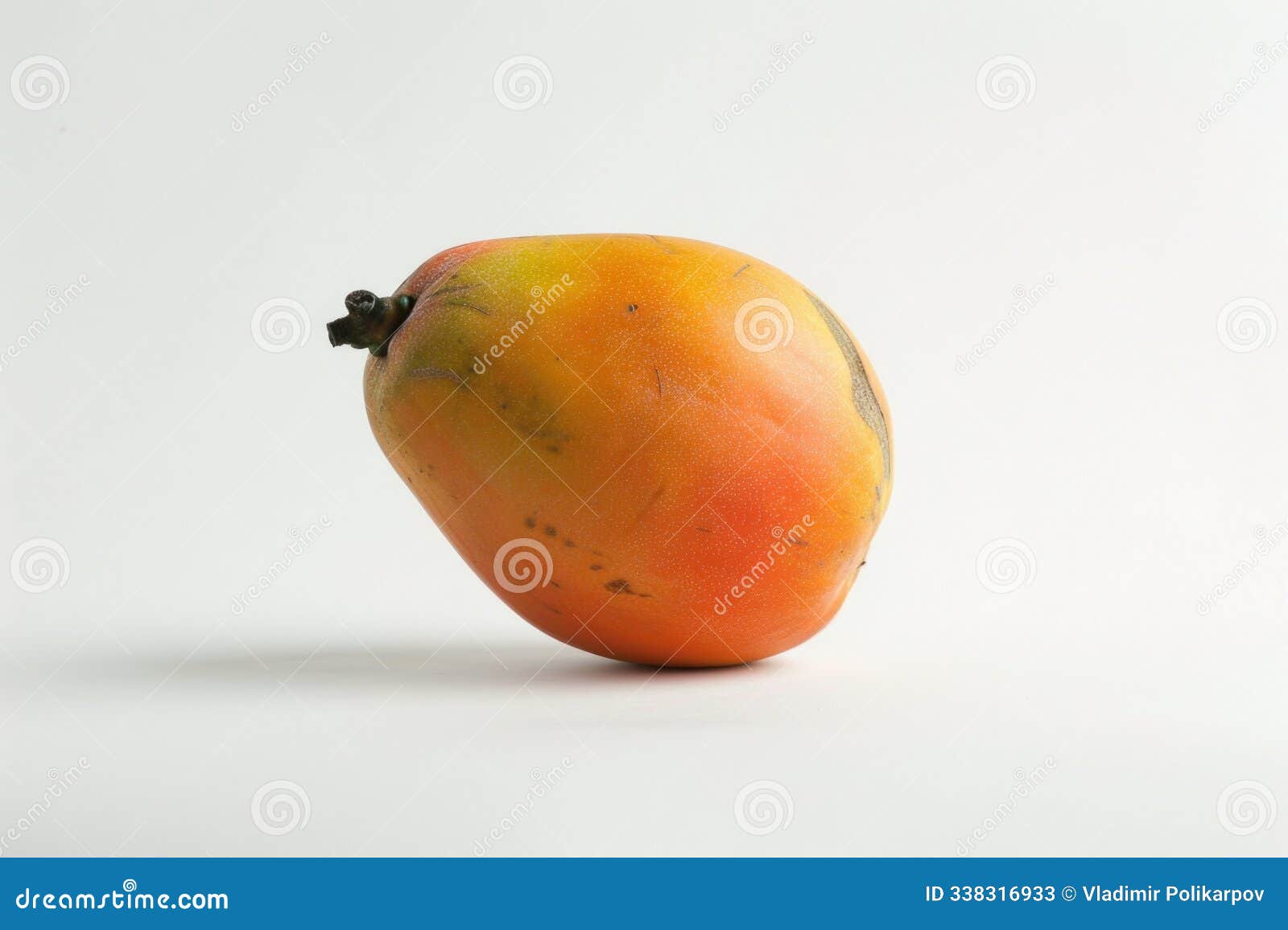 A Ripe Single Mango Sitting on a White Surface Stock Image - Image of ...