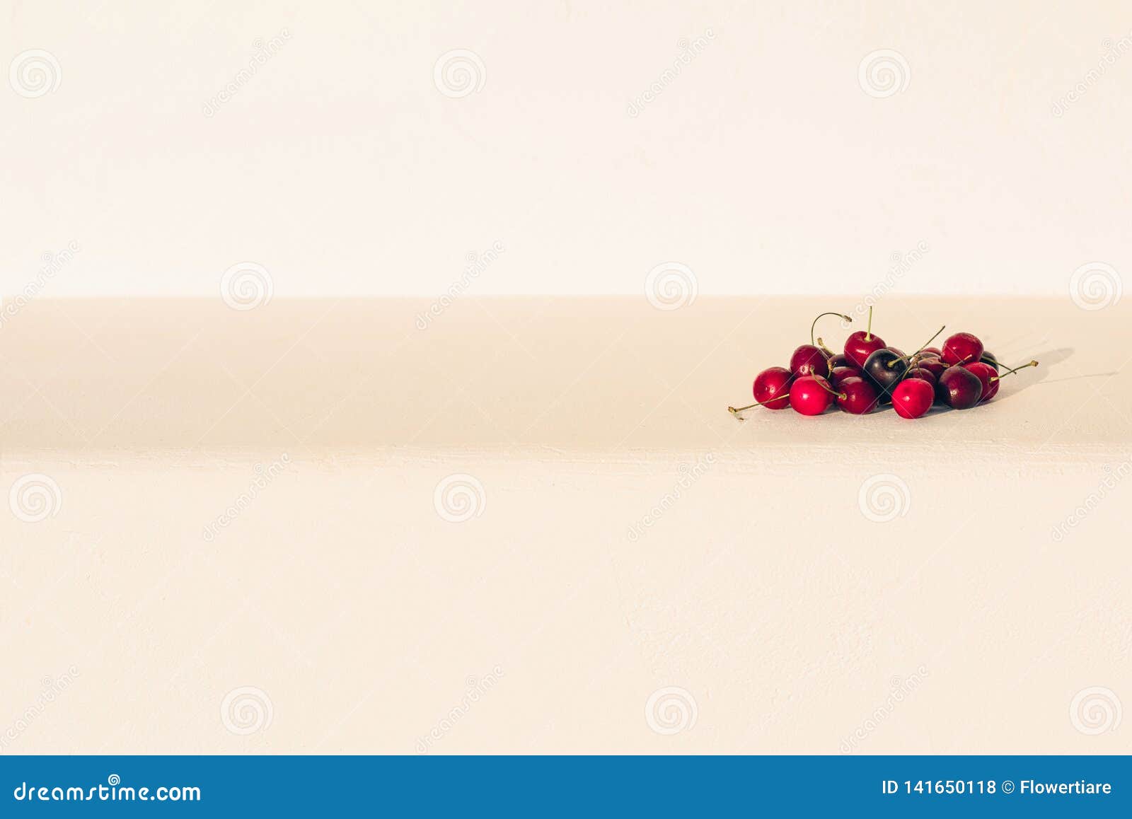 Ripe Sweet Cherry on a White Stone Bench on a Sunny Summer Evening ...