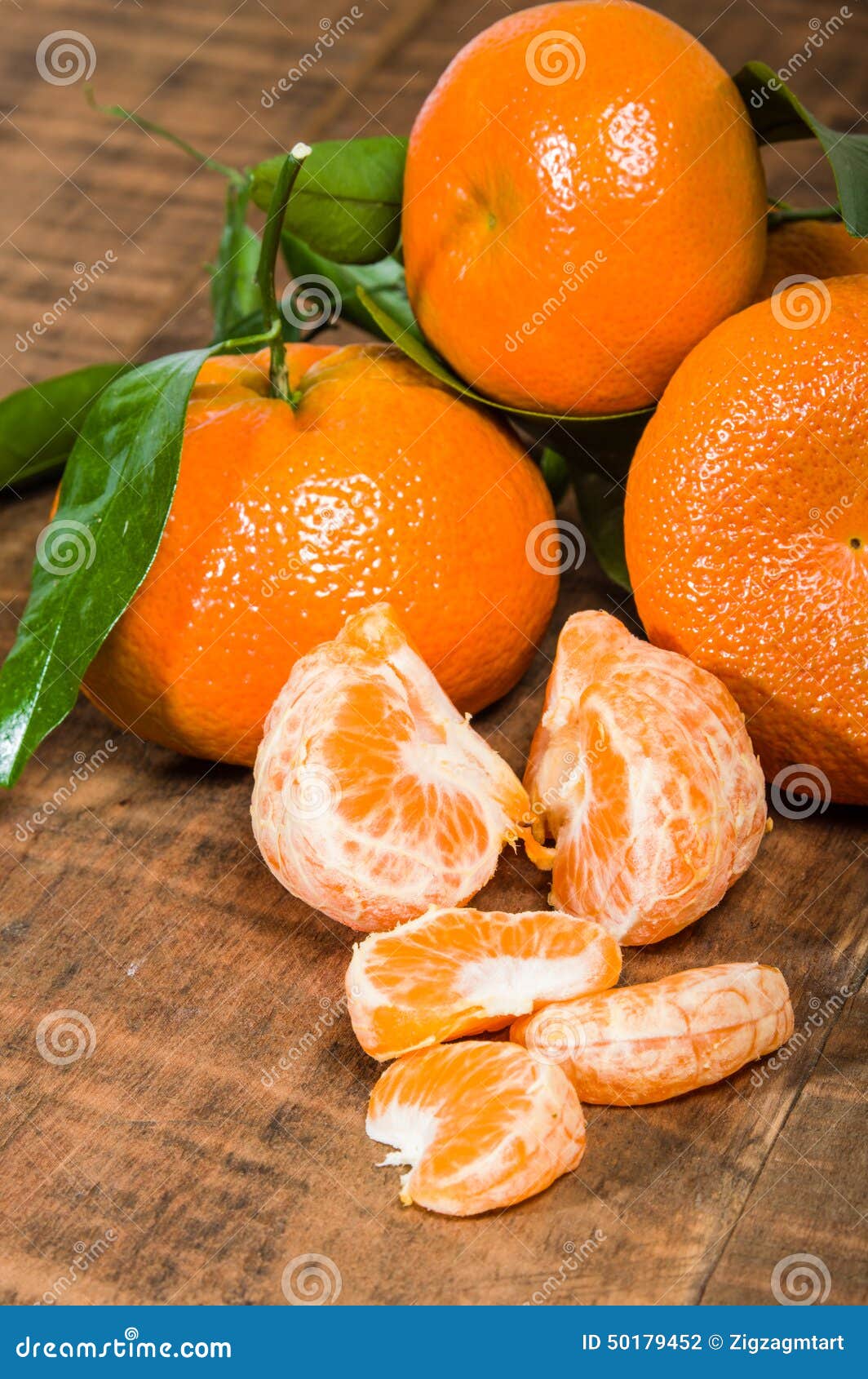 Ripe Tangelos with Leaves and Sections Stock Photo - Image of foods ...