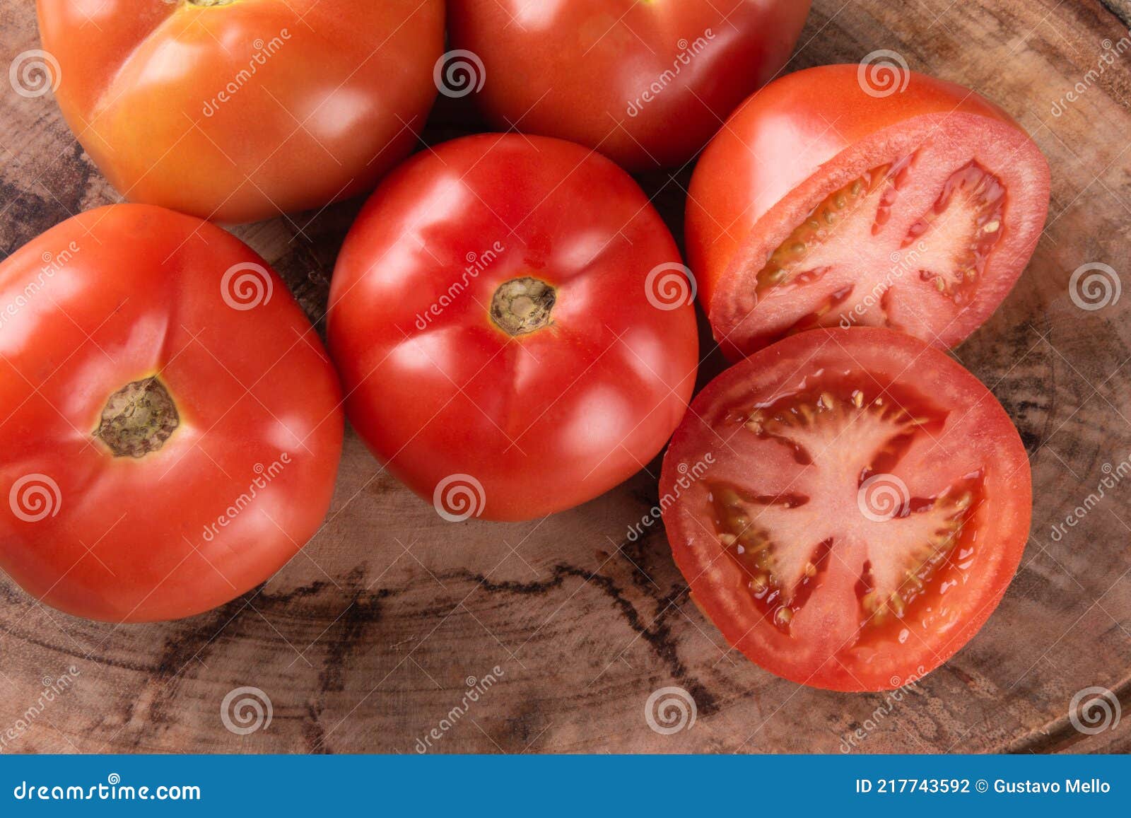 Ripe Tomatoes Cut on Rustic Wood Stock Photo - Image of vegan, close ...