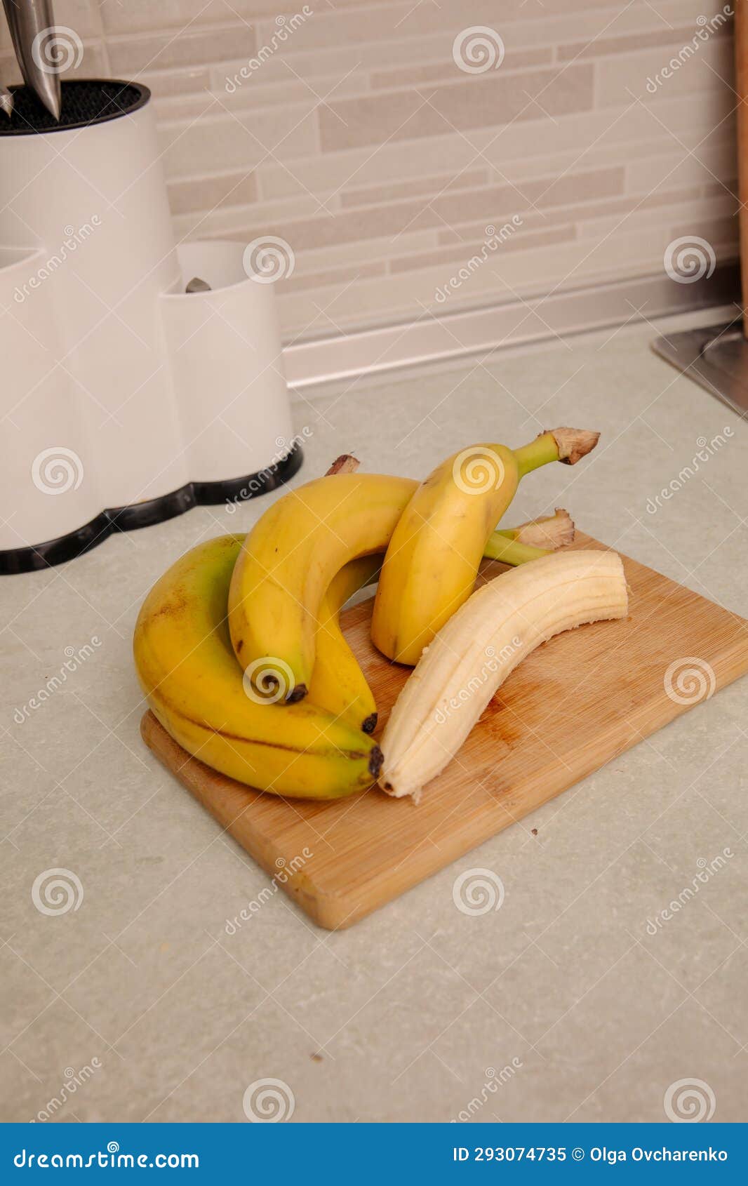 Ripe Yellow Banana, Peeled Banana, Slices of Ripe Banana on the Kitchen ...