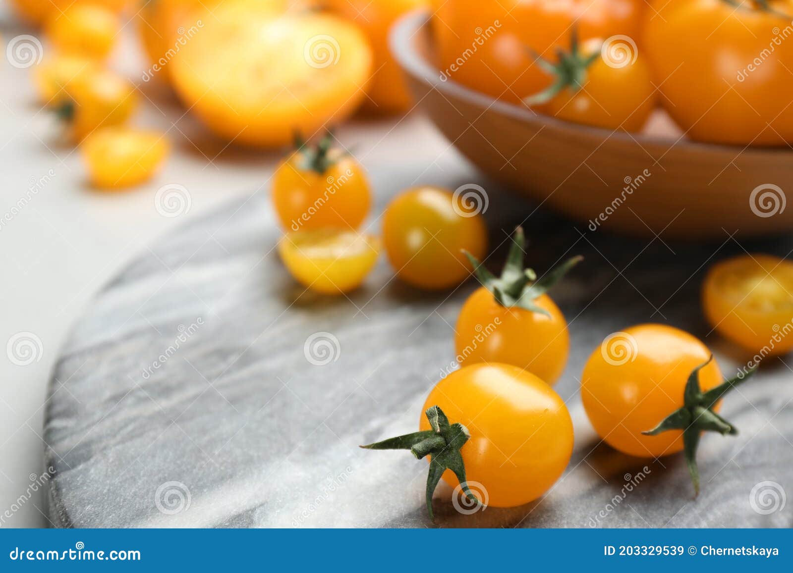 Ripe Yellow Tomatoes on Marble Board, Closeup. Space for Text Stock ...