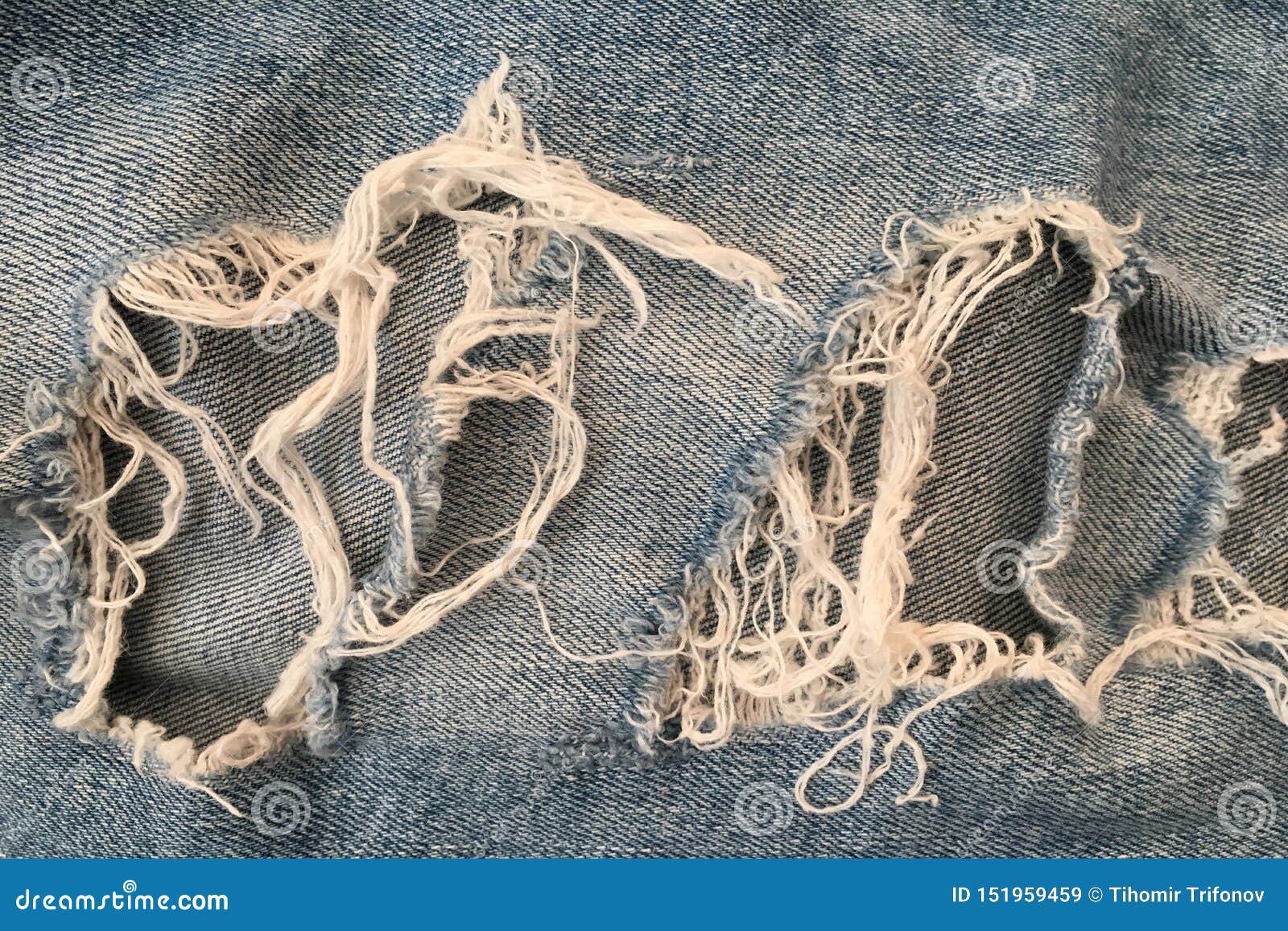 Ripped Denim Jeans Background. Texture of Denim or Blue Jeans ...