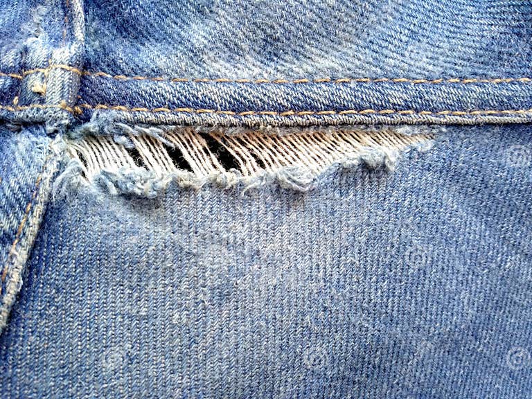 Ripped Destroyed Jeans Background. Jeans Torn Denim Texture Stock Photo ...