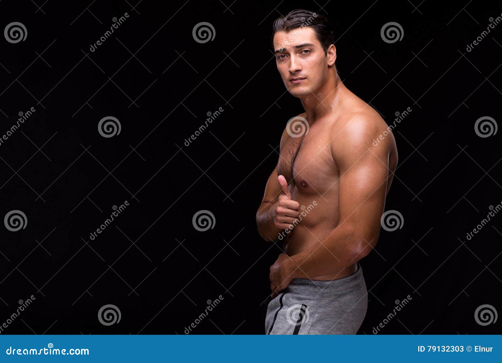 The Ripped Muscular Man on Black Background Stock Image - Image of ...