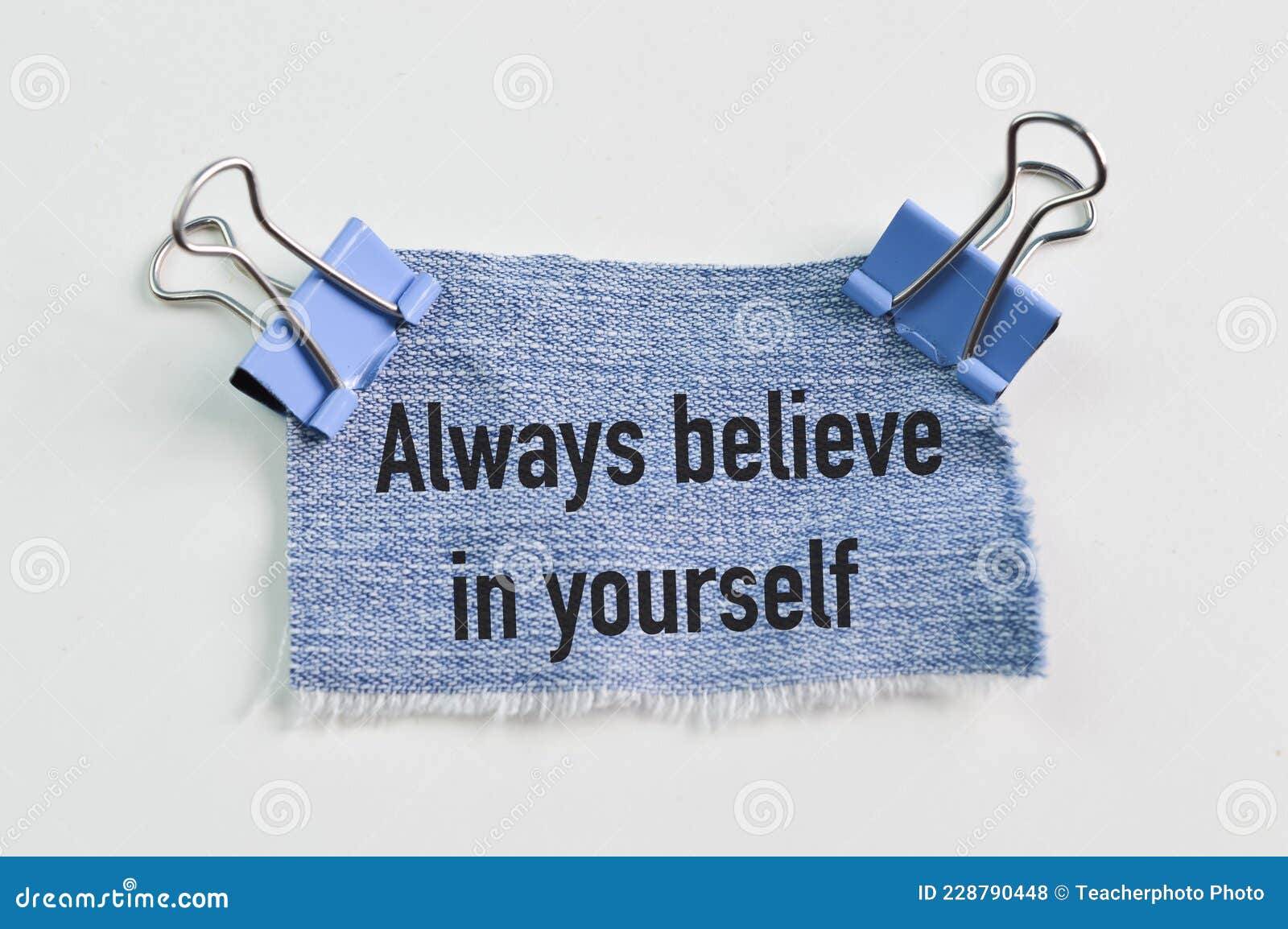 Ripped Pieces of Jeans with Text always BELIEVE in YOURSELF Stock Photo ...