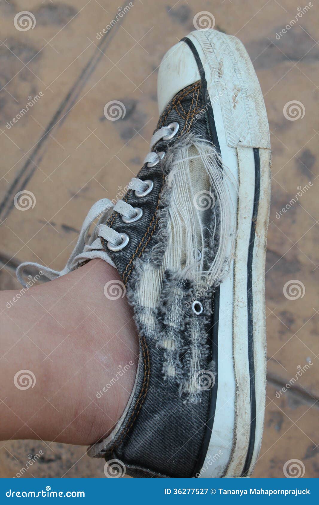 A ripped shoe stock image. Image of challenge, persist - 36277527