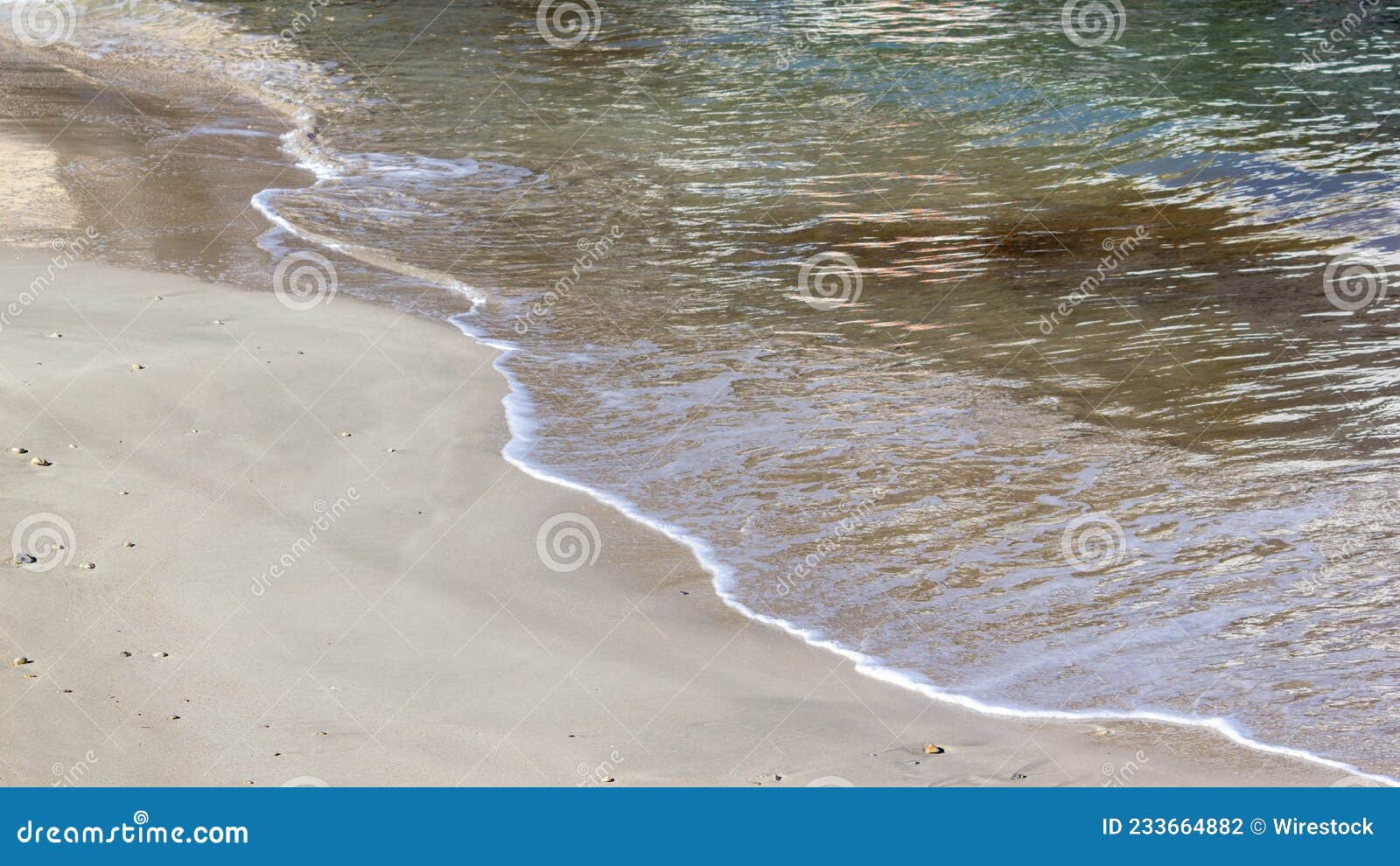 Ripple on a sandy beach stock photo. Image of peace - 233664882