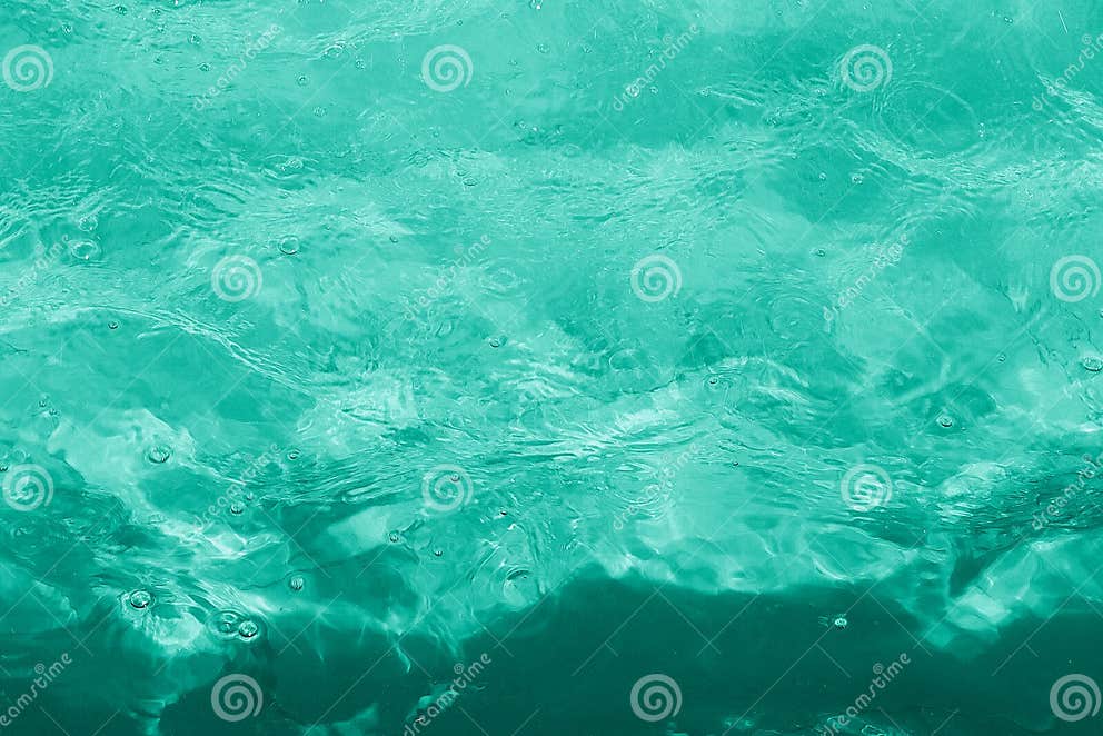 Rippled Pattern of Clean Water in a Green Swimming Pool. Green Water ...