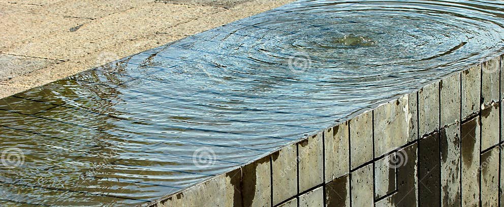 Ripples on Horizontal Water Surface in a Fountain Stock Photo - Image ...
