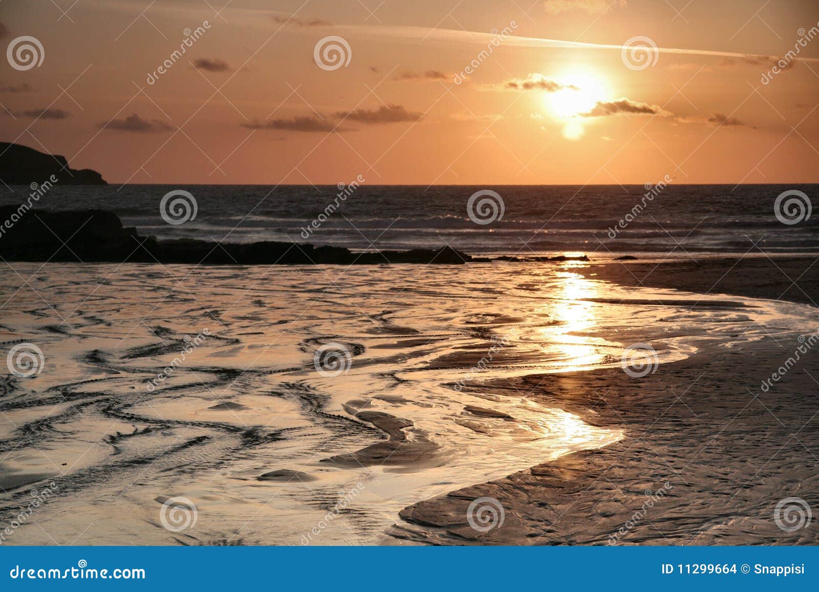 Ripples at sunset stock photo. Image of reflections, sand - 11299664