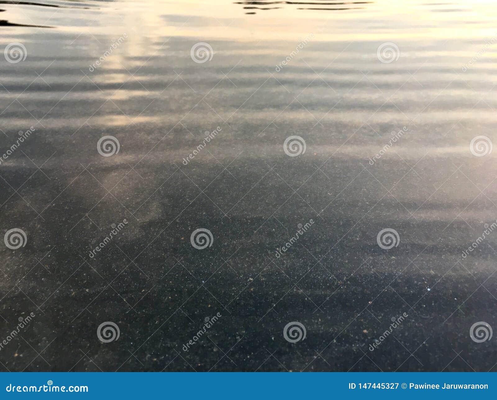 Ripples of Water on Cement Floor with Sunshine Reflection on Water ...