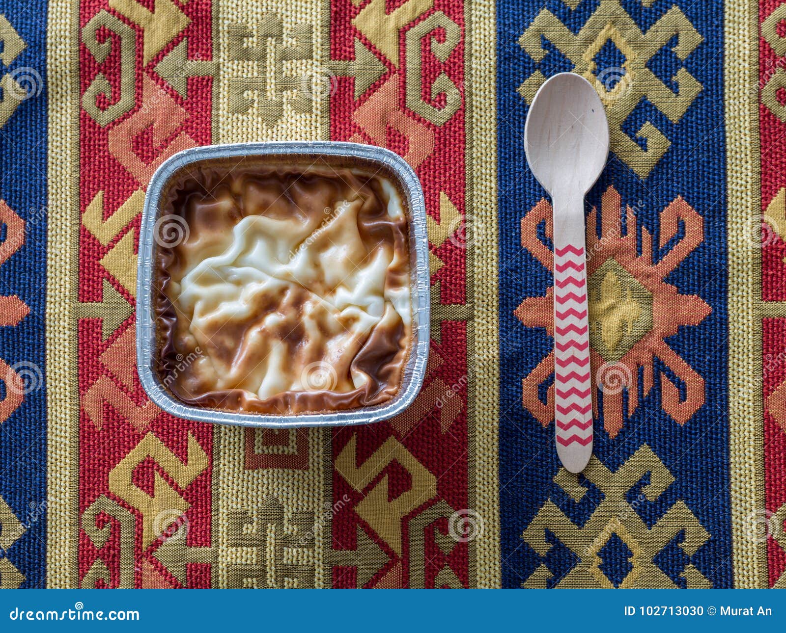 Rise Pudding on Traditional Carpet with Spoon Stock Photo - Image of ...