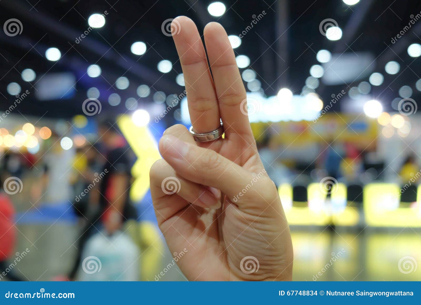 Rise of Two Finger in Shopping Mall Stock Photo - Image of light, girl ...